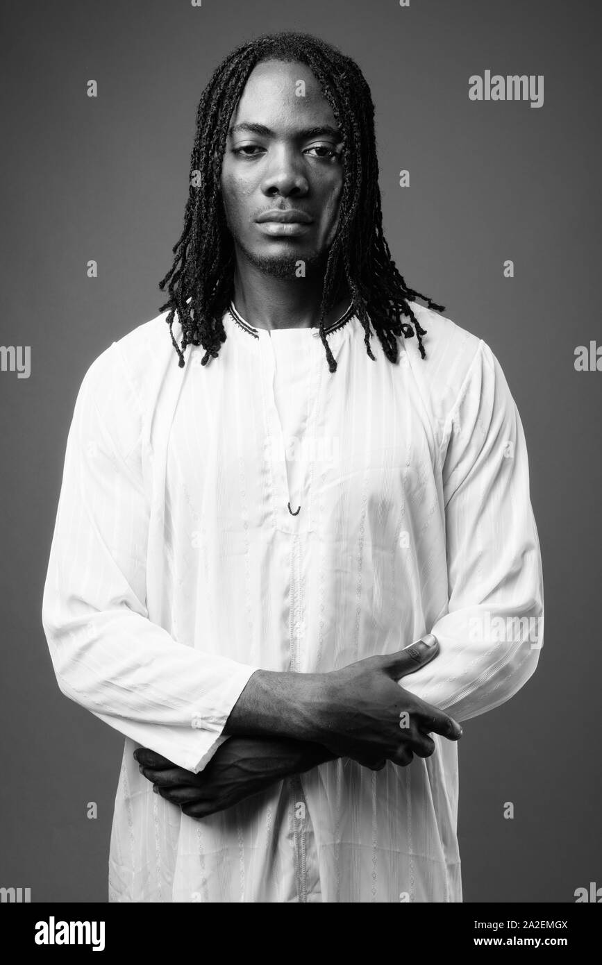 Portrait handsome african guy arms Black and White Stock Photos ...