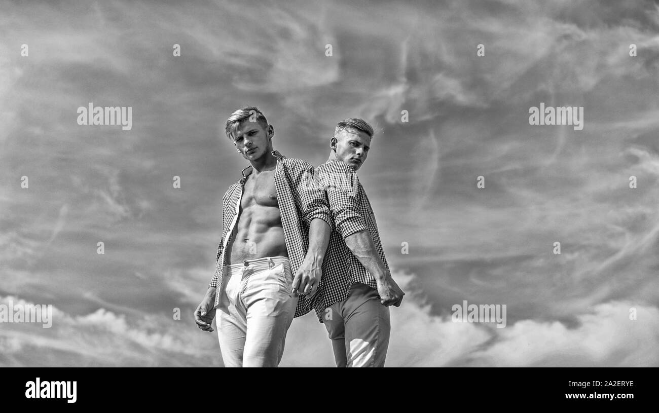 Brothers twins looks attractive. Fashionable similar outfits. Men twins ...