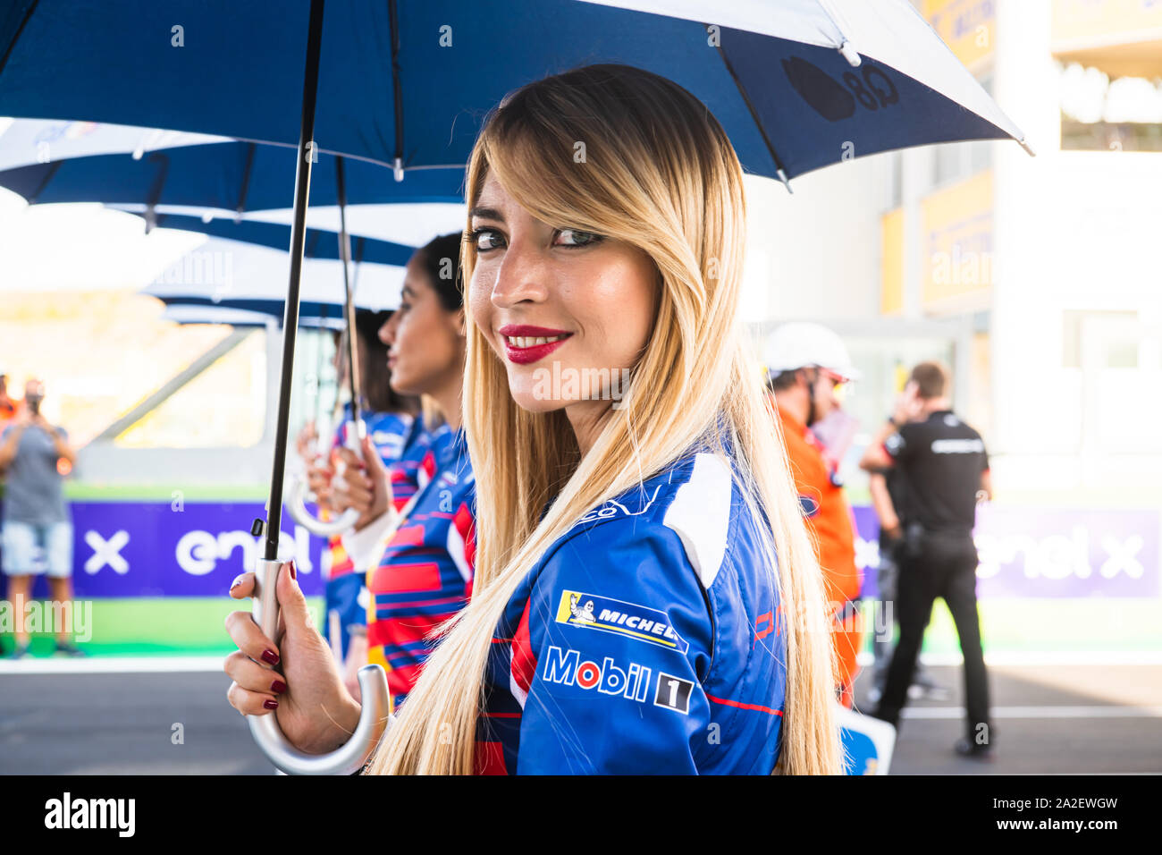 Umbrella girl on grid race hi-res stock photography and images - Alamy