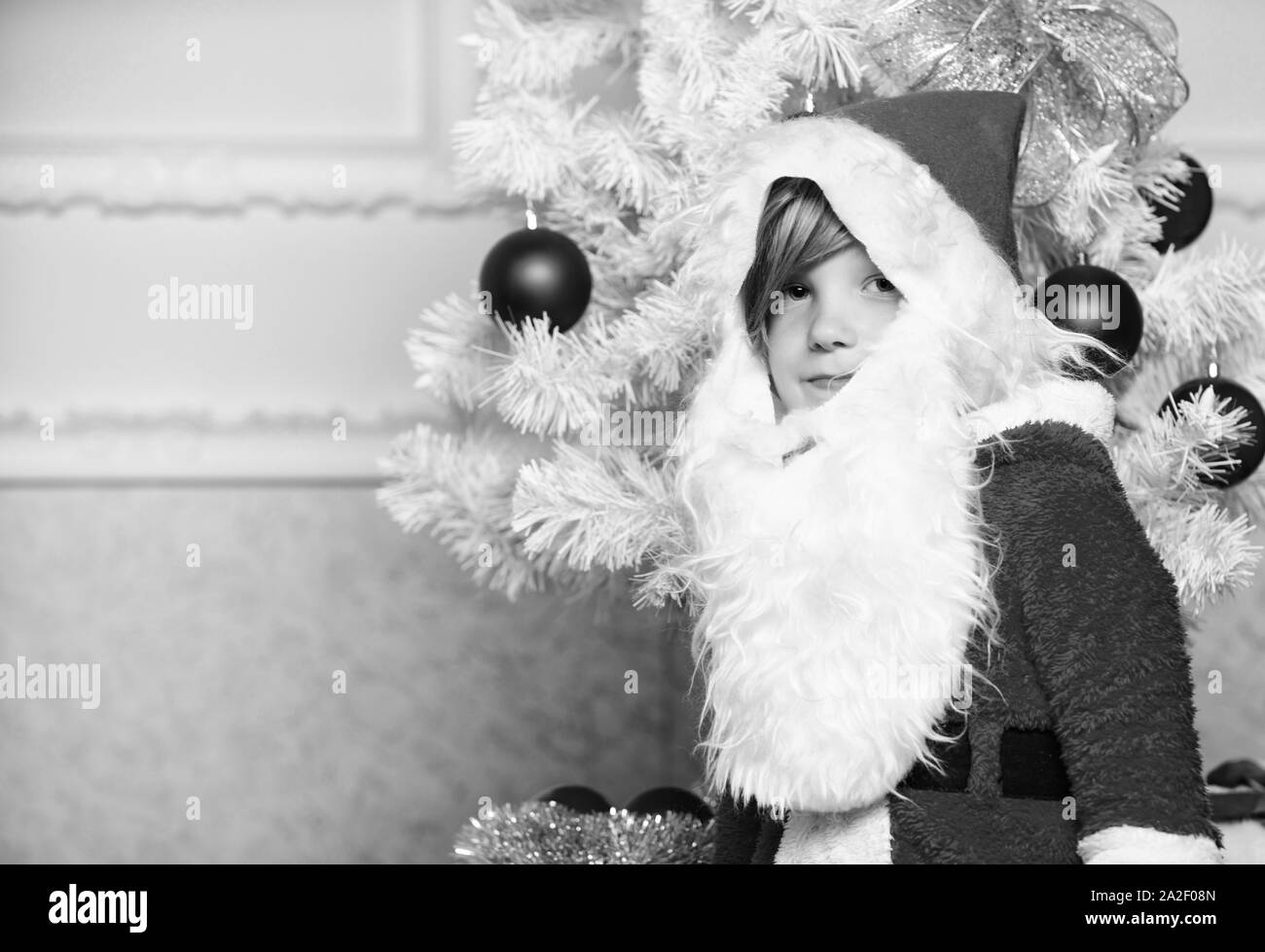 Christmas tree ideas for kids. Boy kid dressed as santa with white ...