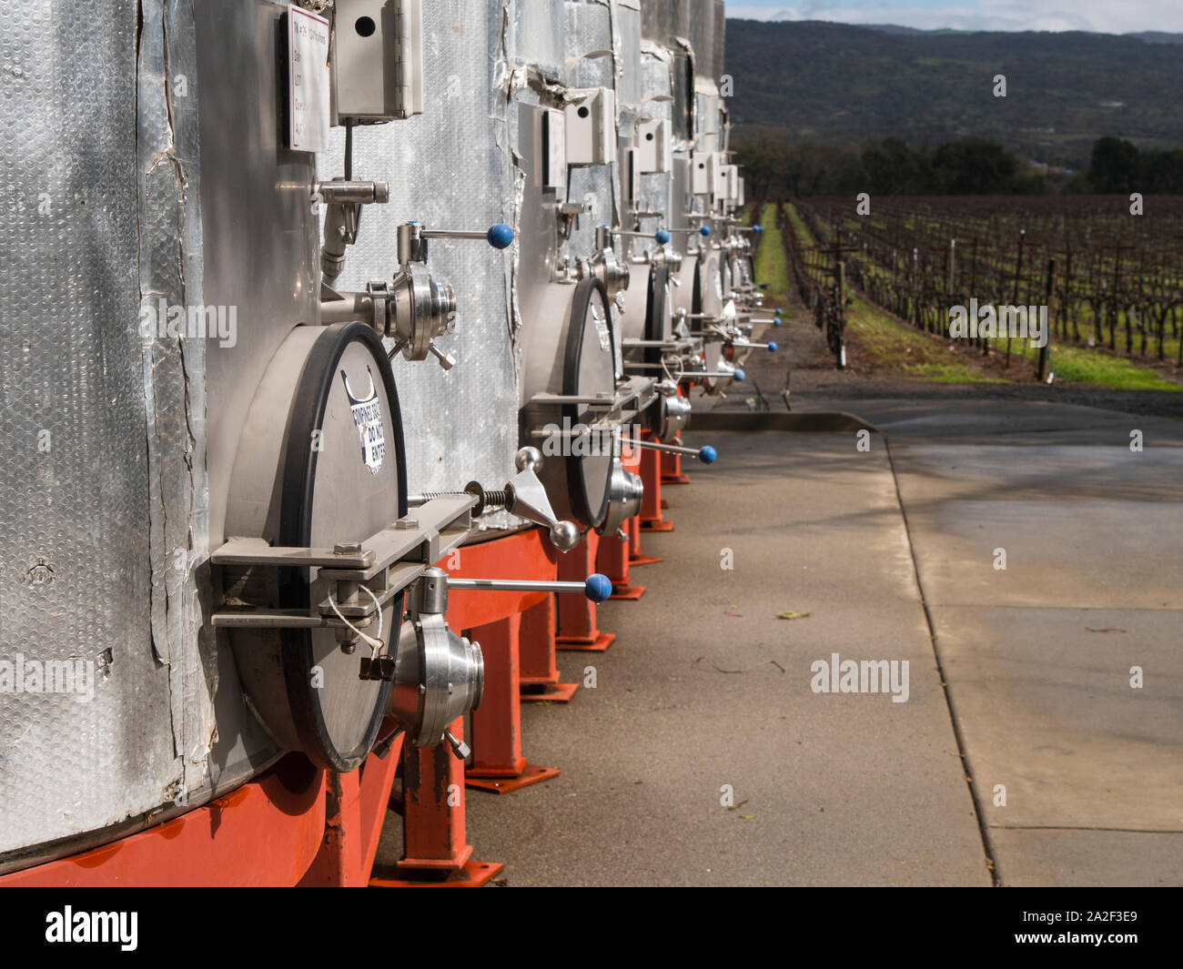 A close up view of large metal wine containers at a vineyard Stock ...