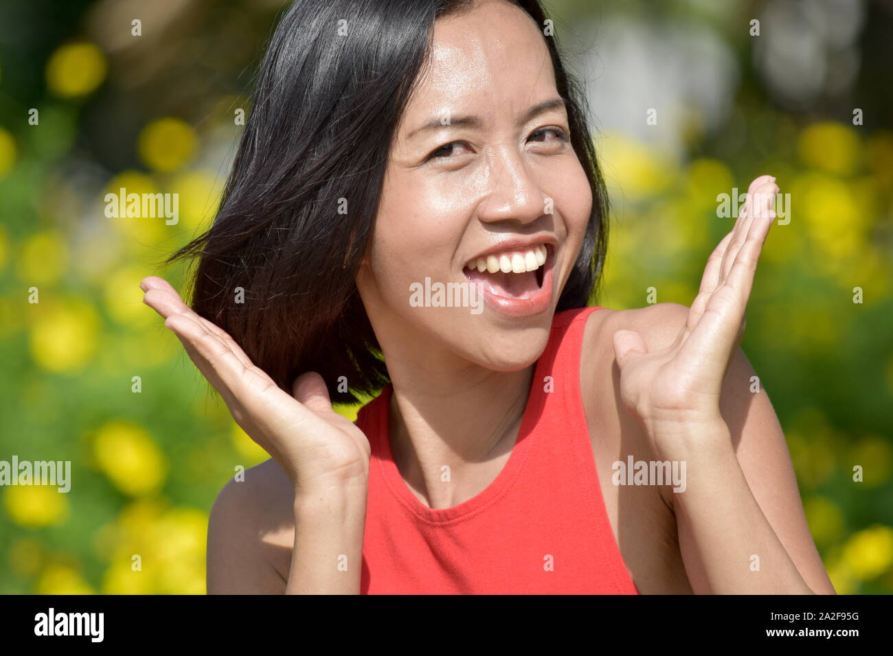 A Surprised Pretty Asian Person Stock Photo - Alamy