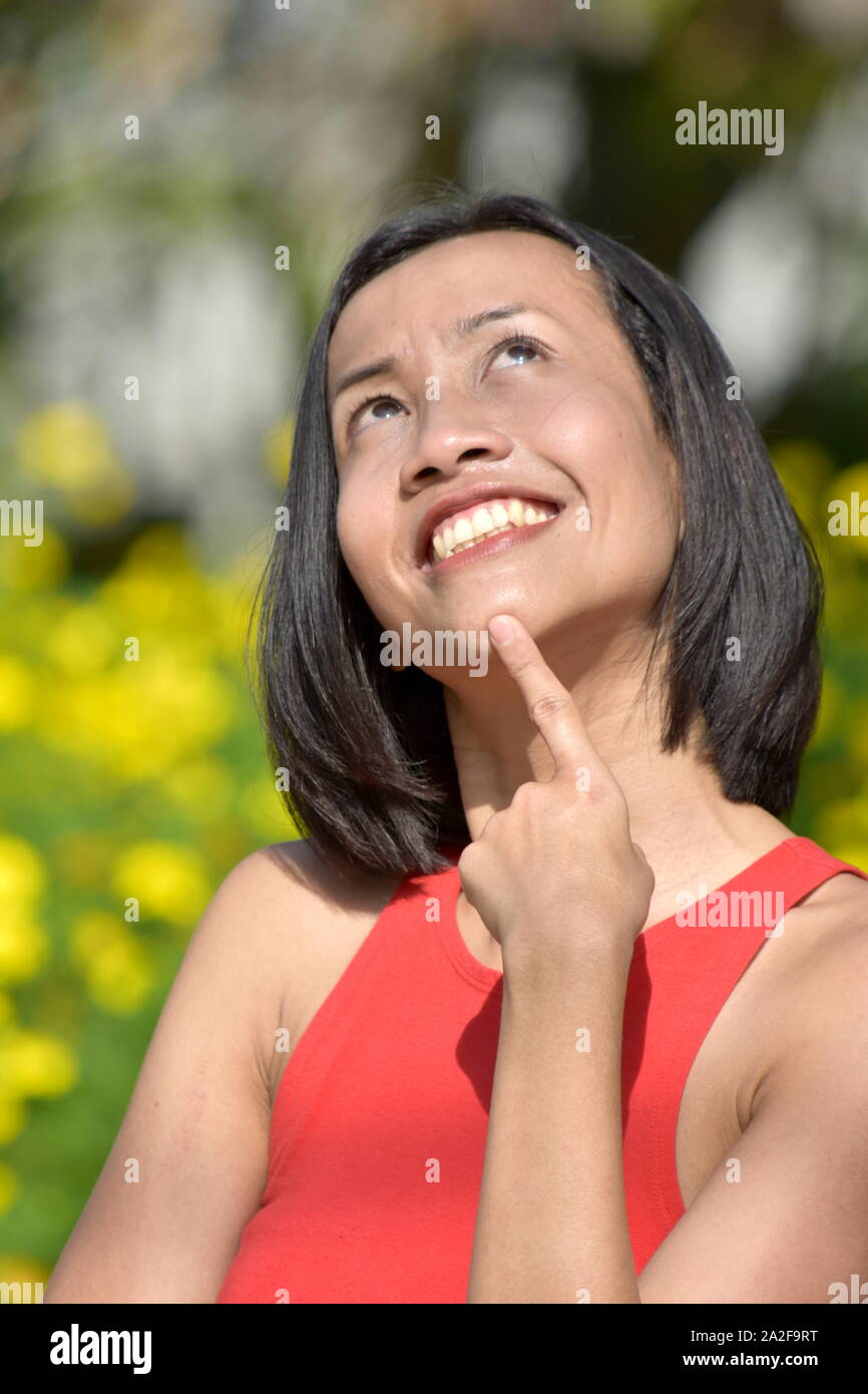 An Adult Female Thinking Stock Photo - Alamy