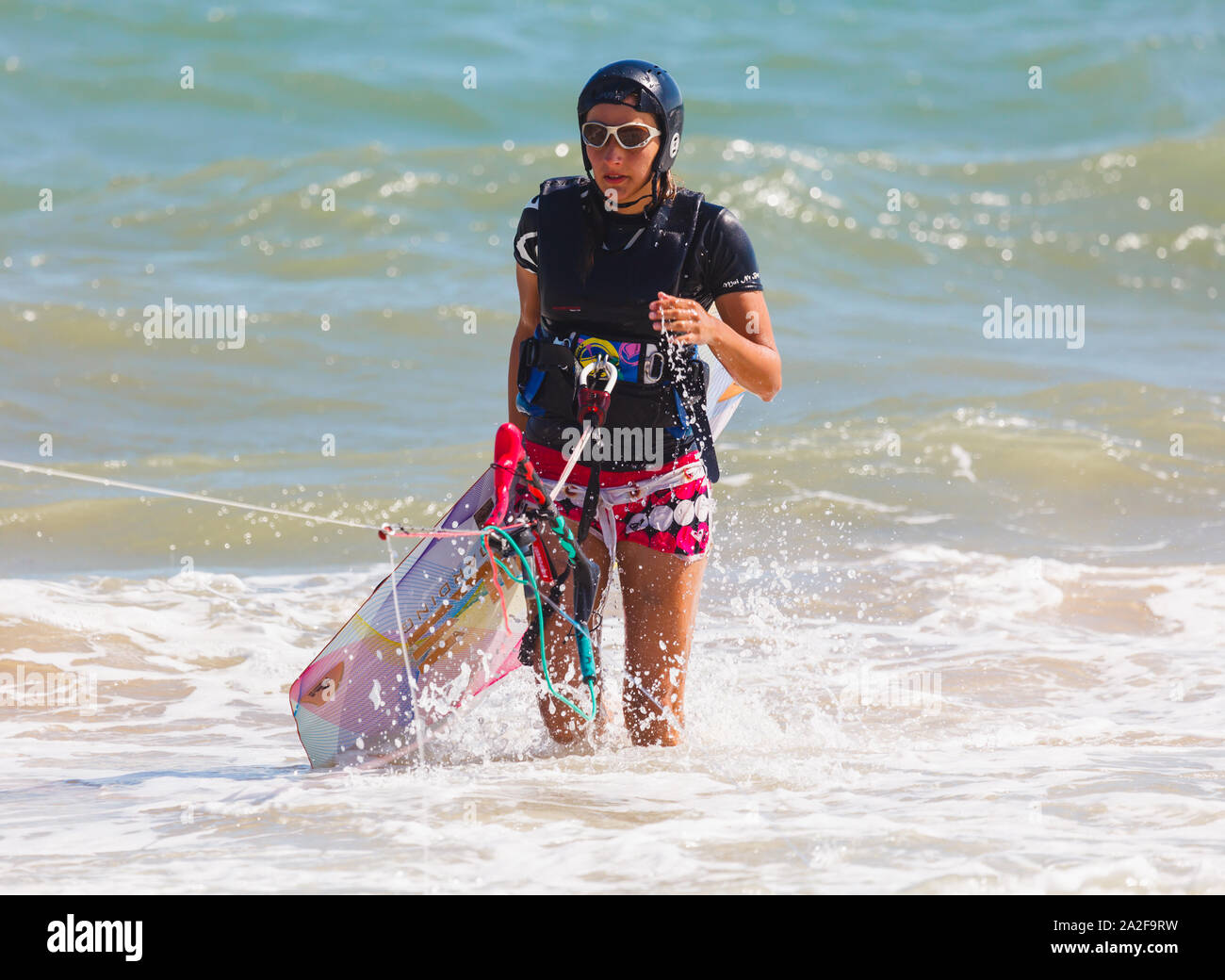 Girl athlete kitesurfing Stock Photo - Alamy