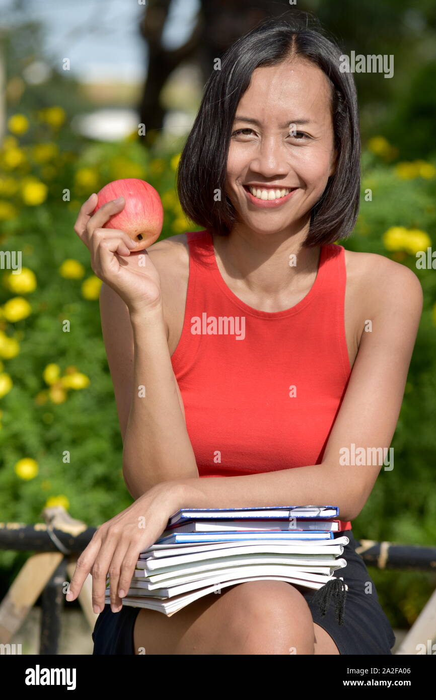 A Diverse Female Teacher Smiling Stock Photo - Alamy