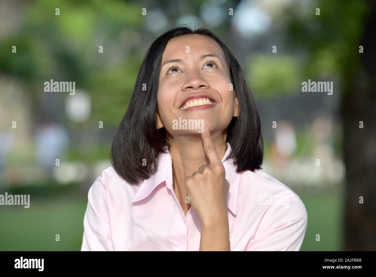 Thoughtful beautiful mature woman hi-res stock photography and images ...