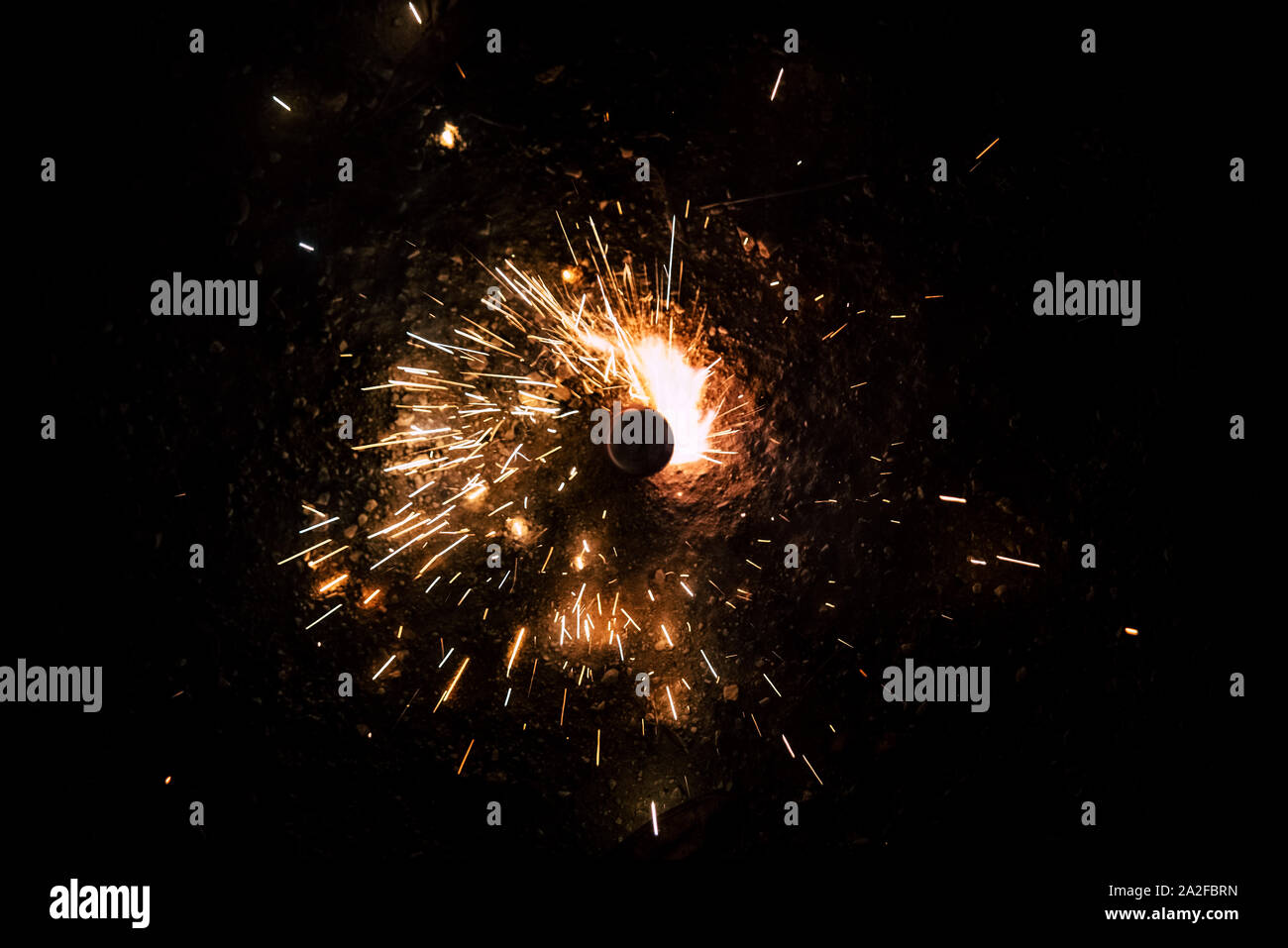 Firecrackers spinning illuminating the night with their sparks Stock ...