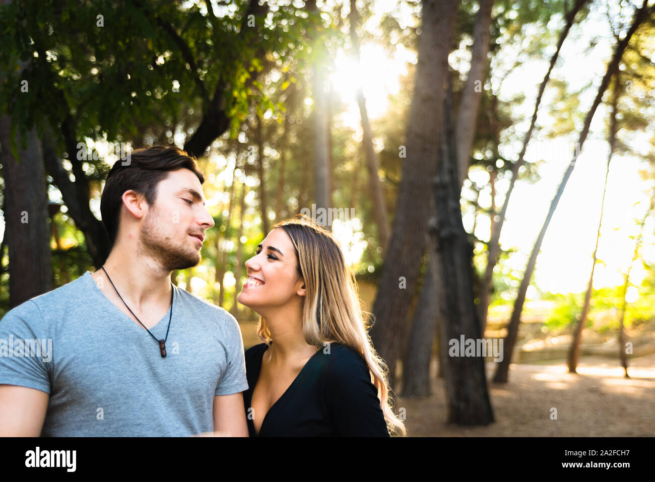 Couple of handsome models in love flirting with each other with love ...