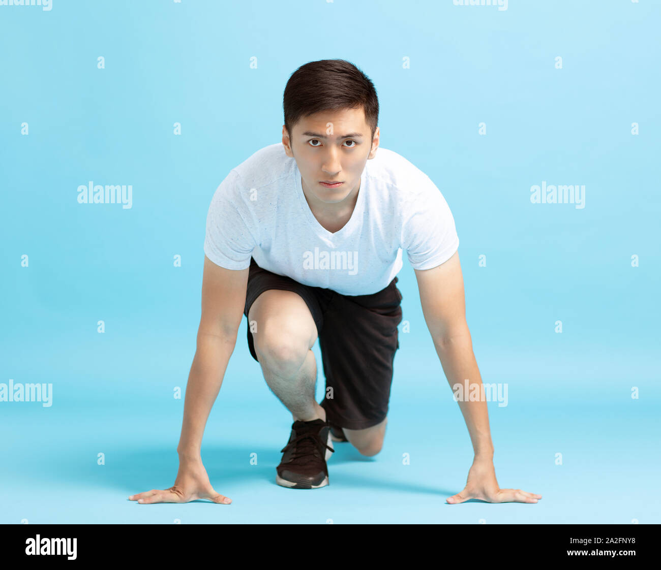 Young sportsman in active hi-res stock photography and images - Alamy