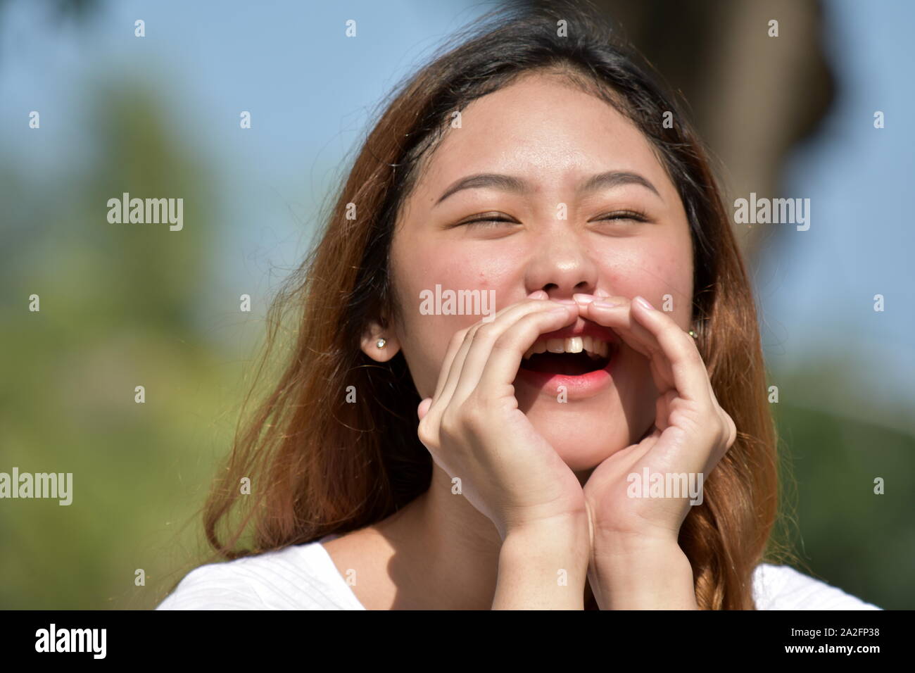 A Shouting Beautiful Diverse Female Stock Photo - Alamy