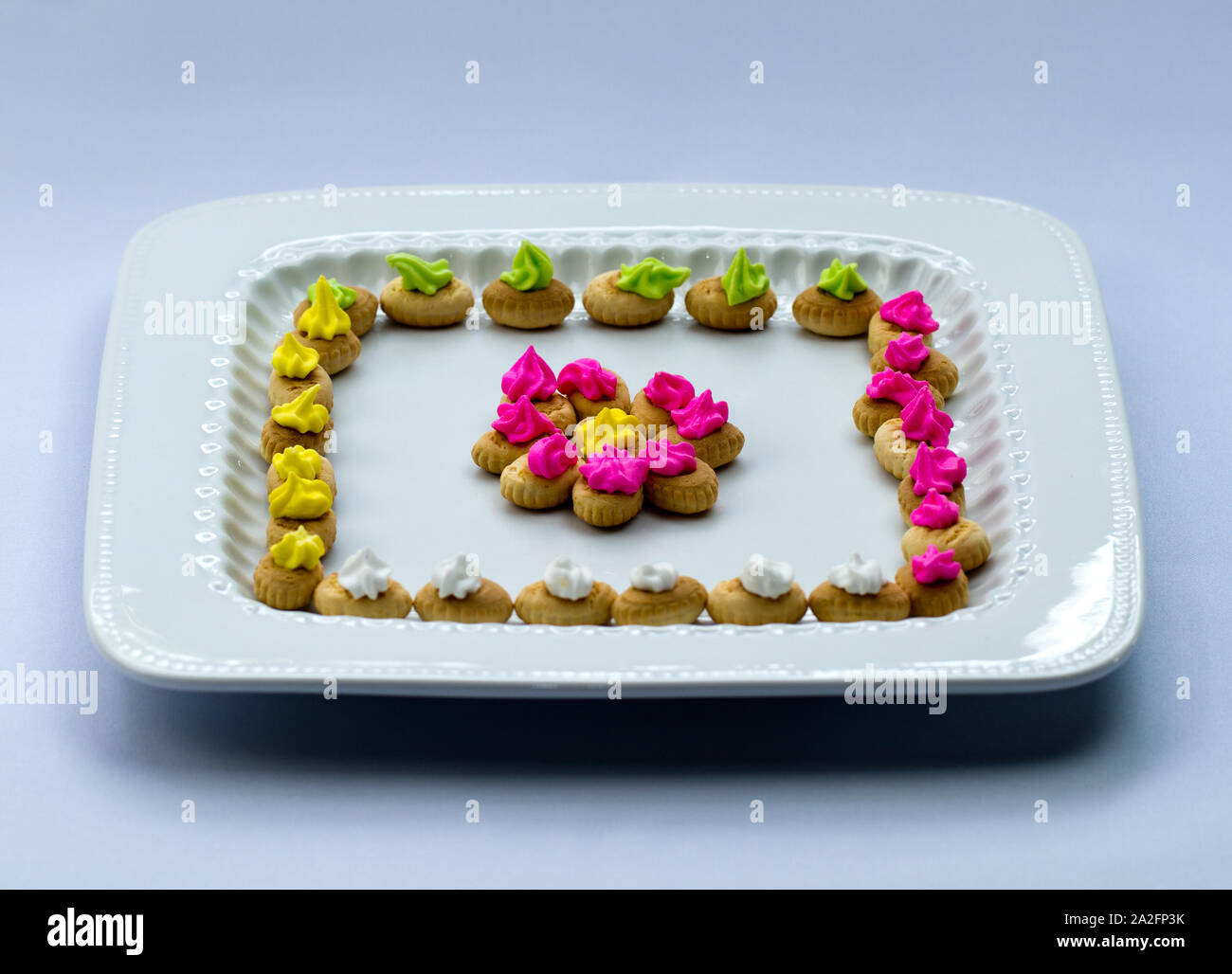 sugar cookies on white rectangular plate Stock Photo - Alamy