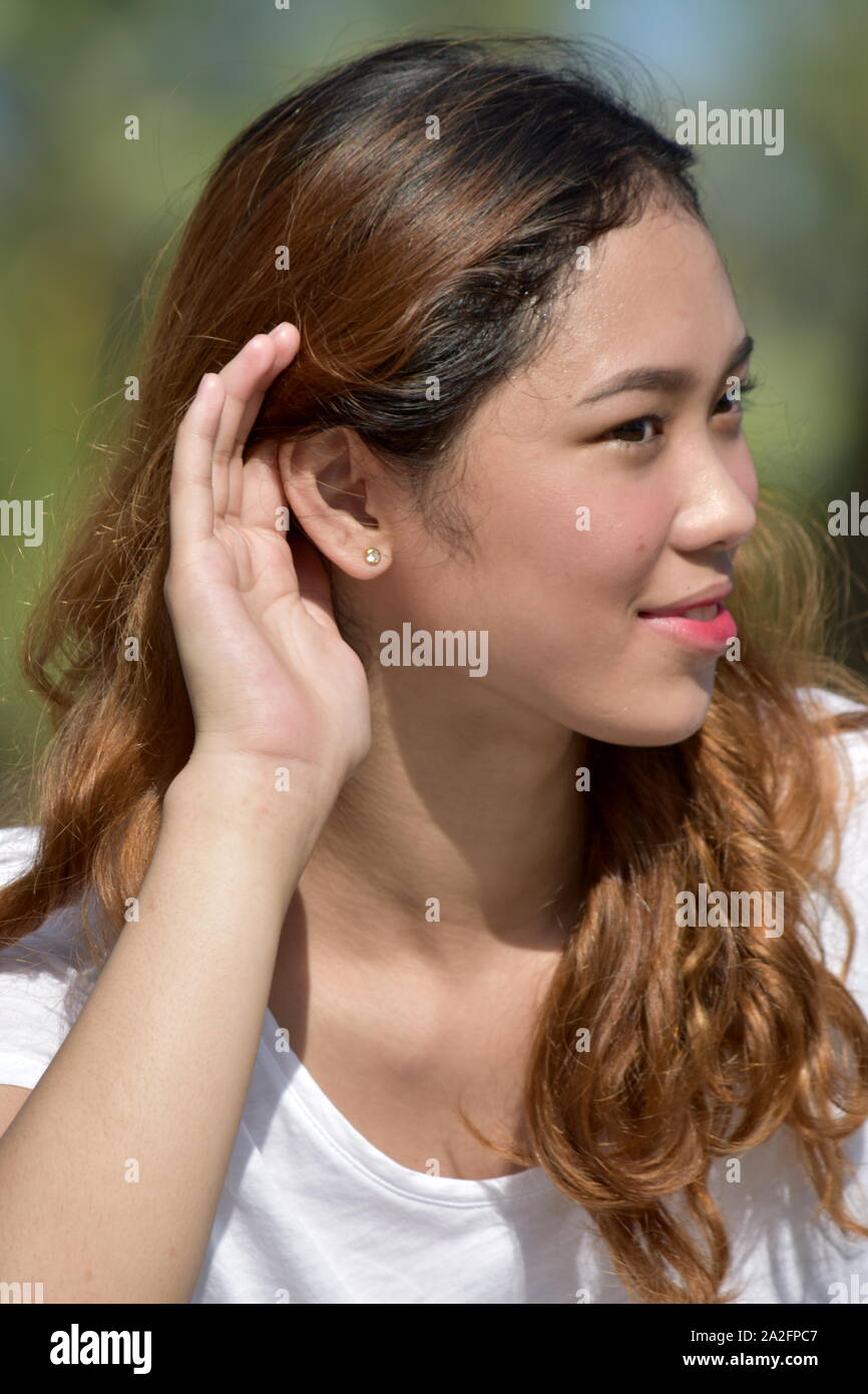 Attractive female hearing hi-res stock photography and images - Alamy