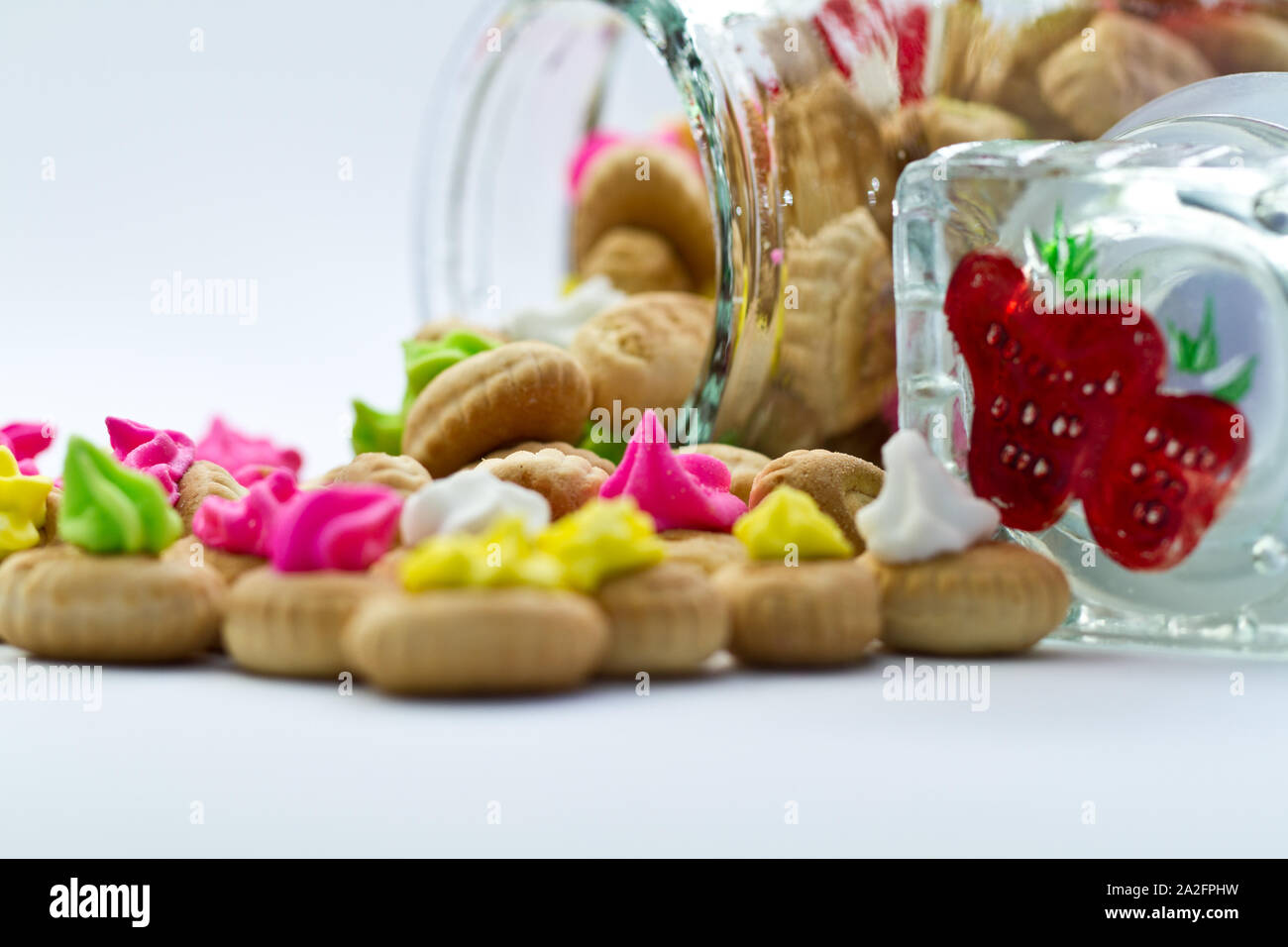 sugar cookies with clear container on white background Stock Photo - Alamy