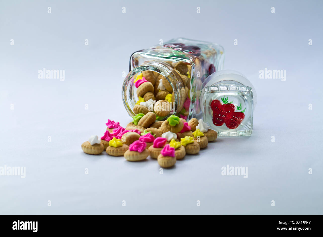 sugar cookies with clear container on white background Stock Photo - Alamy