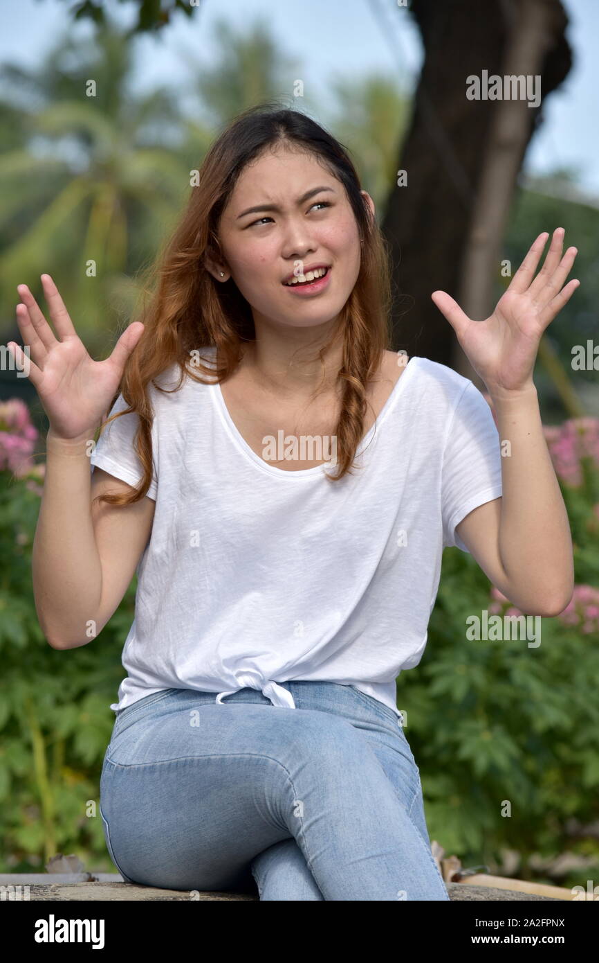 A Confused Pretty Asian Adult Female Stock Photo - Alamy