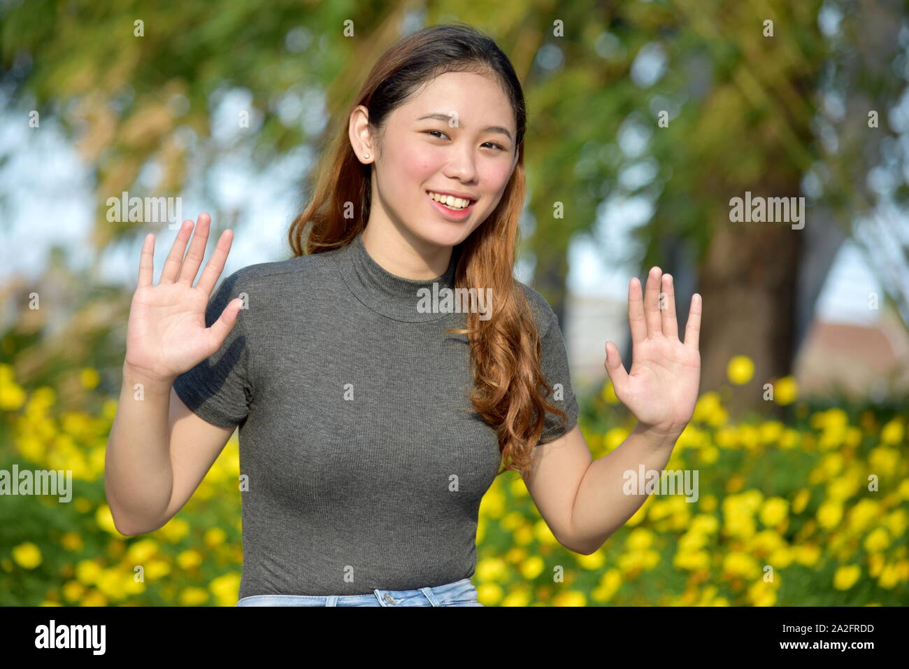Gesturing young beautiful woman hi-res stock photography and images - Alamy