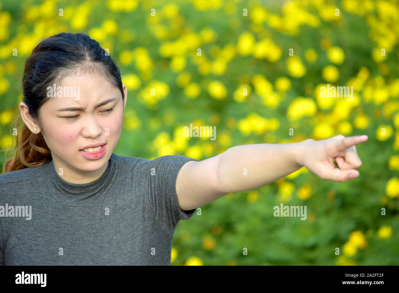 Mad youthful minority woman hi-res stock photography and images - Alamy