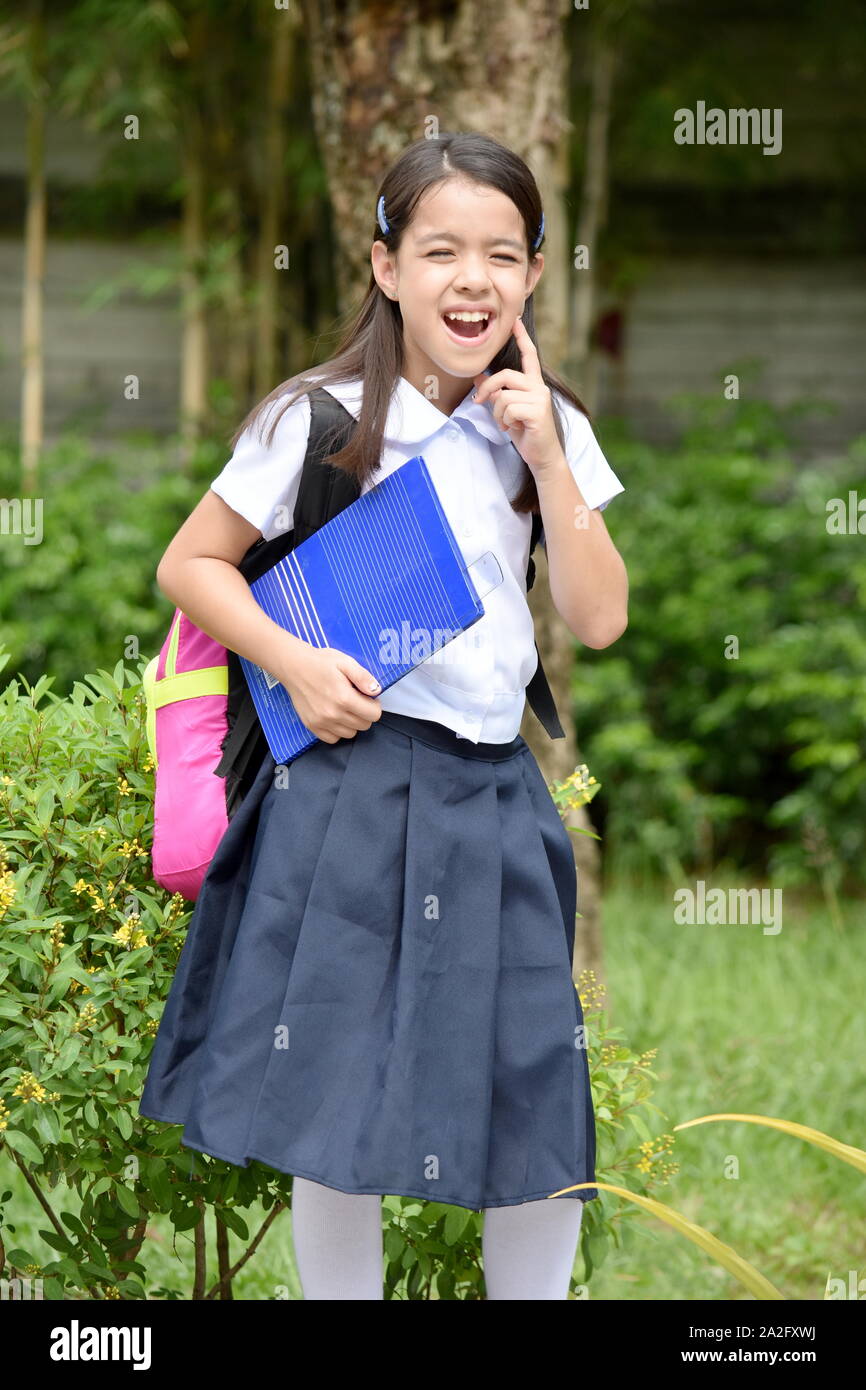 Young Student Child With Toothache With Notebooks Stock Photo - Alamy