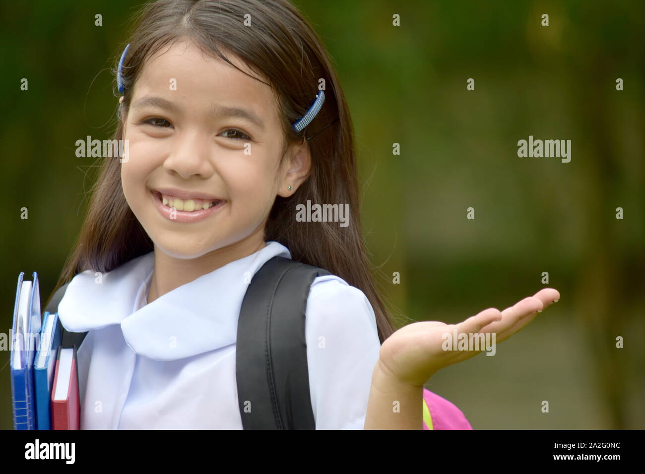 Female Student Making A Decision With Notebooks Stock Photo - Alamy