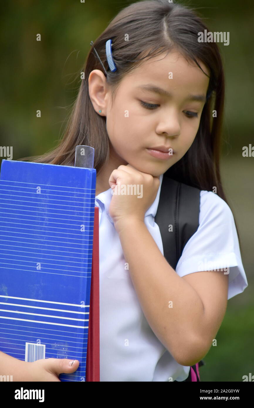 Asian Girl Student Thinking With Notebooks Stock Photo - Alamy