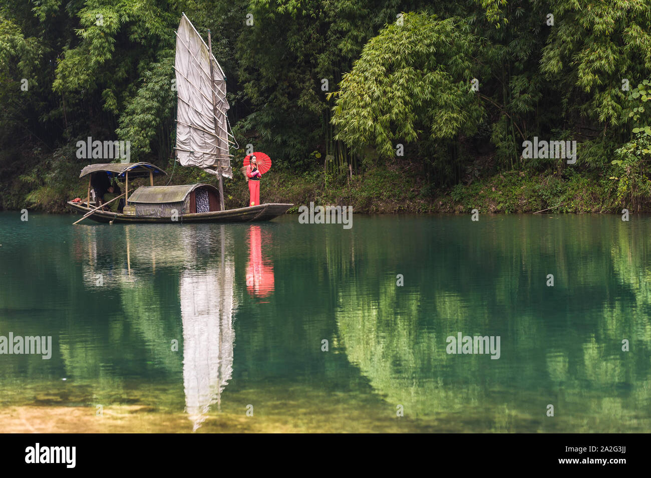 Chongqing, China, 18 Nov 2012: Chinese lady on traditional boat along ...