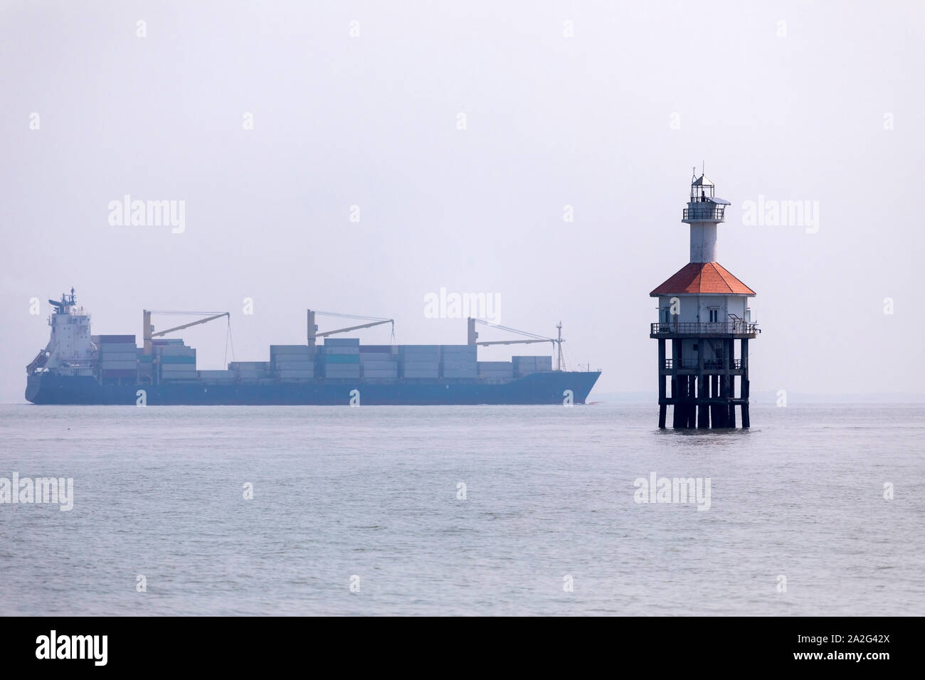 Cargo shipping with containers and a channel marker where the Saigon ...