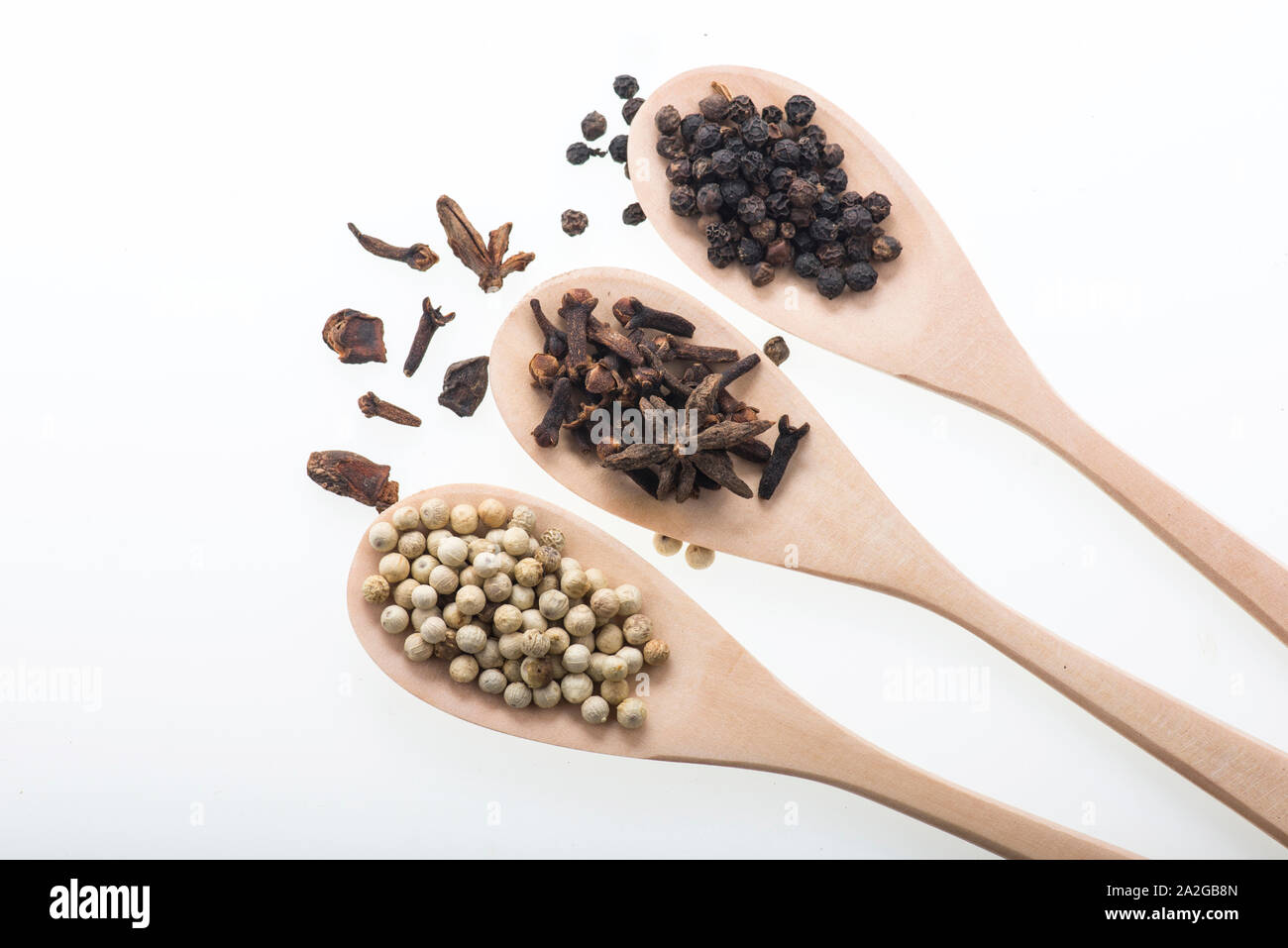 Spices and condiments for culinary on wooden spoon isolated on white ...