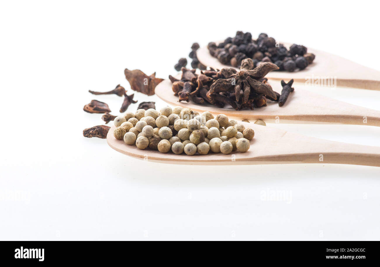 Spices and condiments for culinary on wooden spoon isolated on white ...