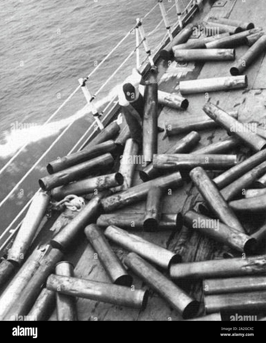 Empty shell casings aboard USS Newport News (CA-148) off Vietnam, circa ...
