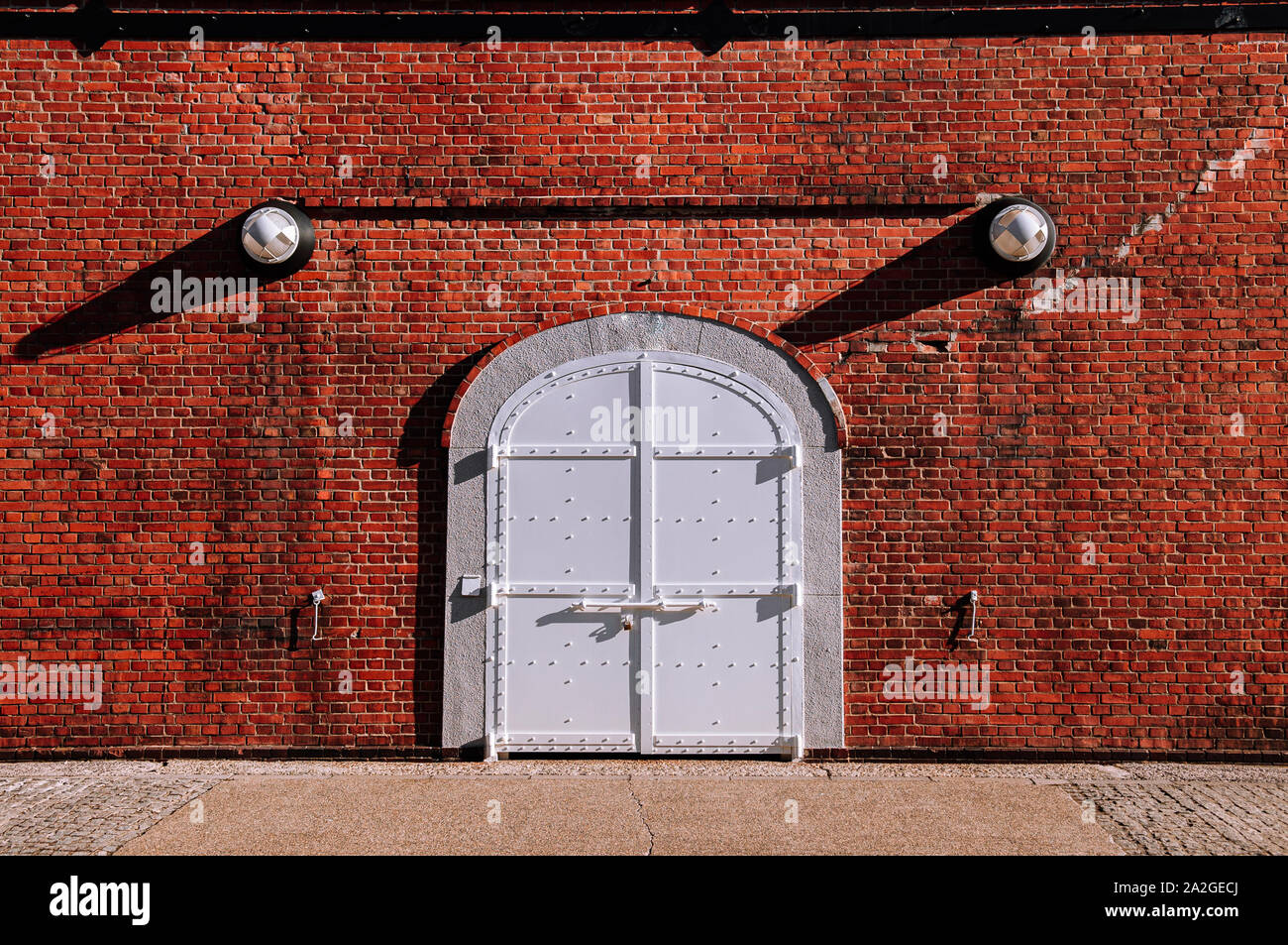 White iron gate with red brick wall old rustic industrial loft retro ...