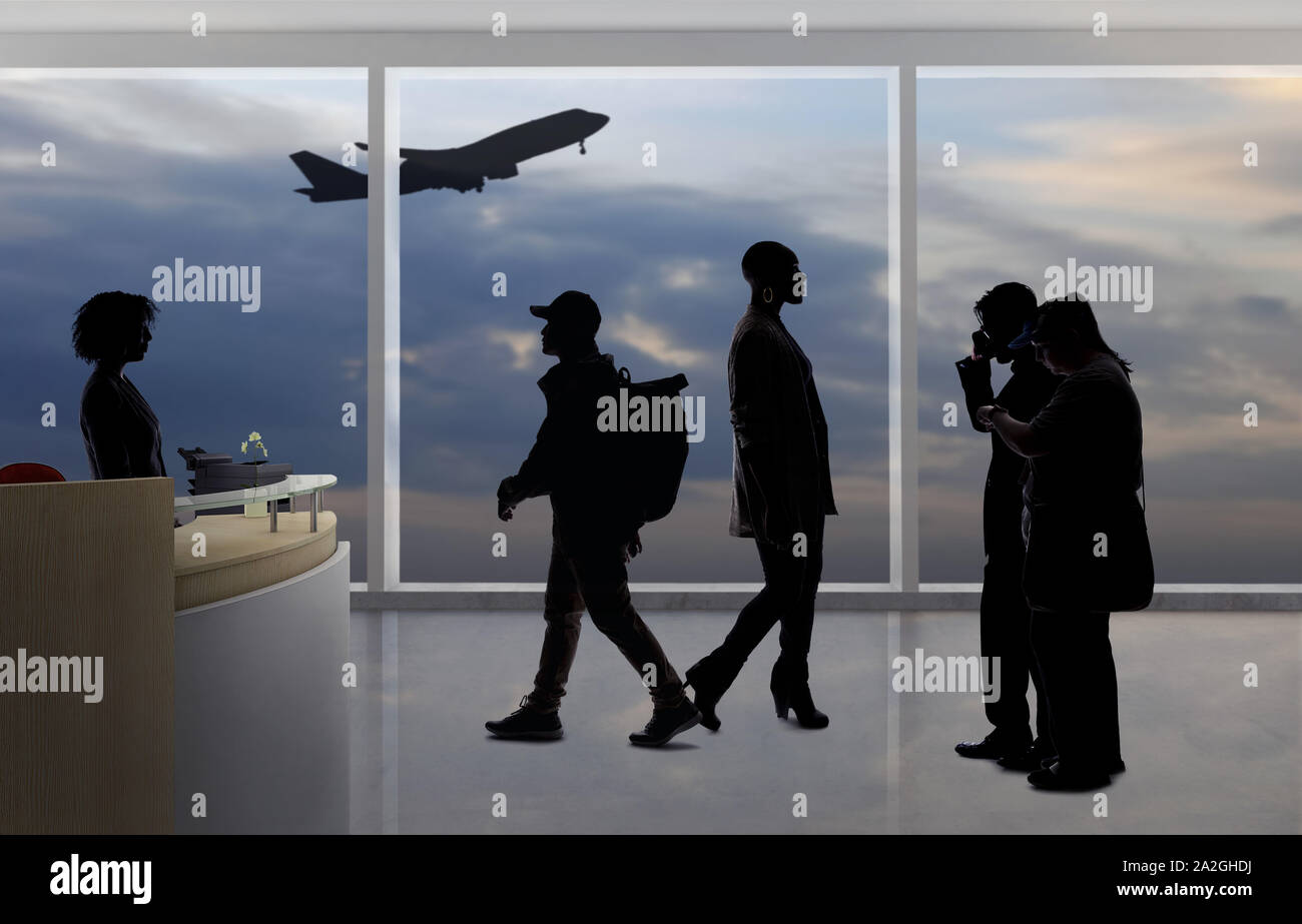 Silhouettes of passengers waiting in line at an airport check in ...