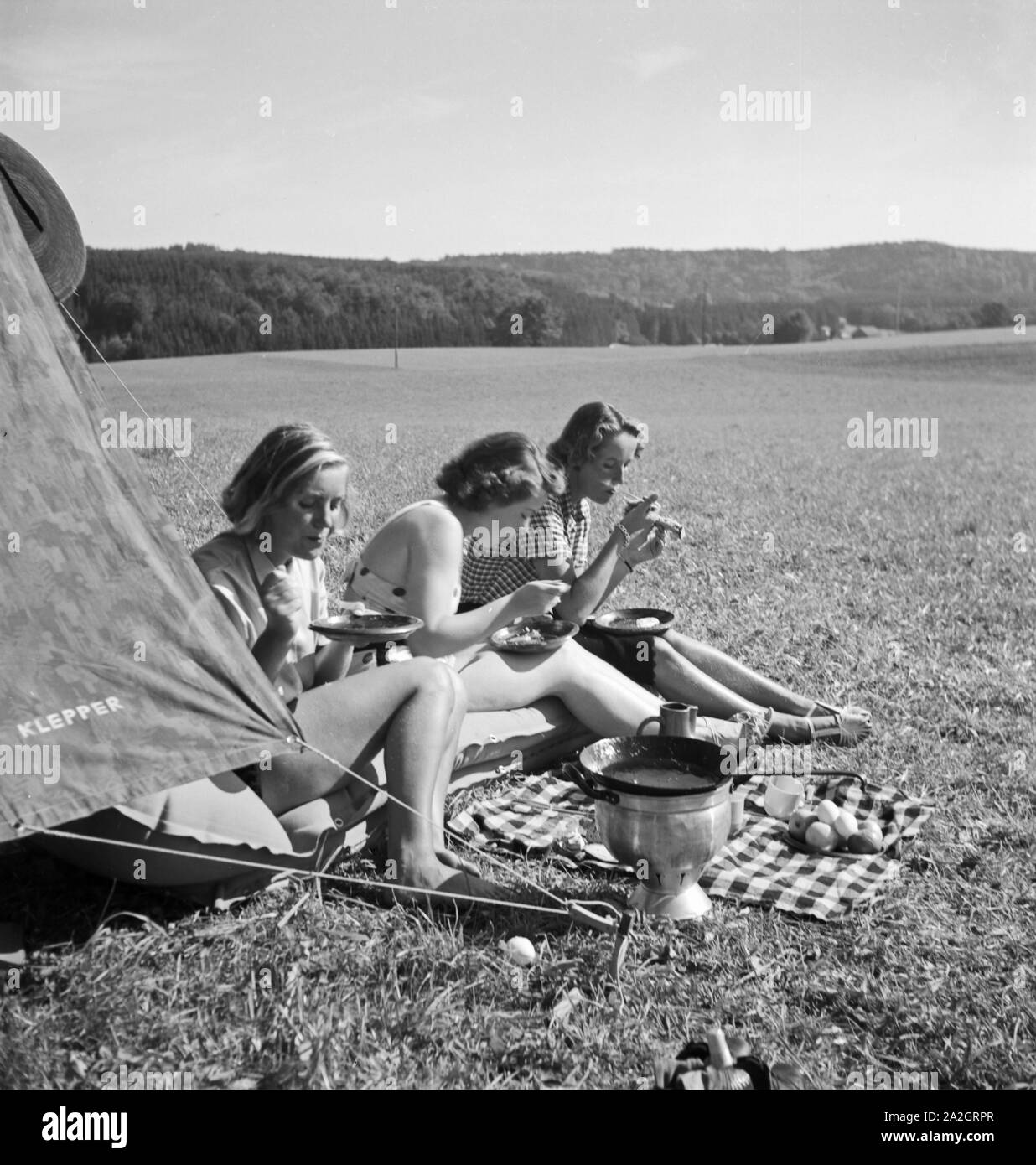 Woman camping on vacation in Black and White Stock Photos & Images - Alamy