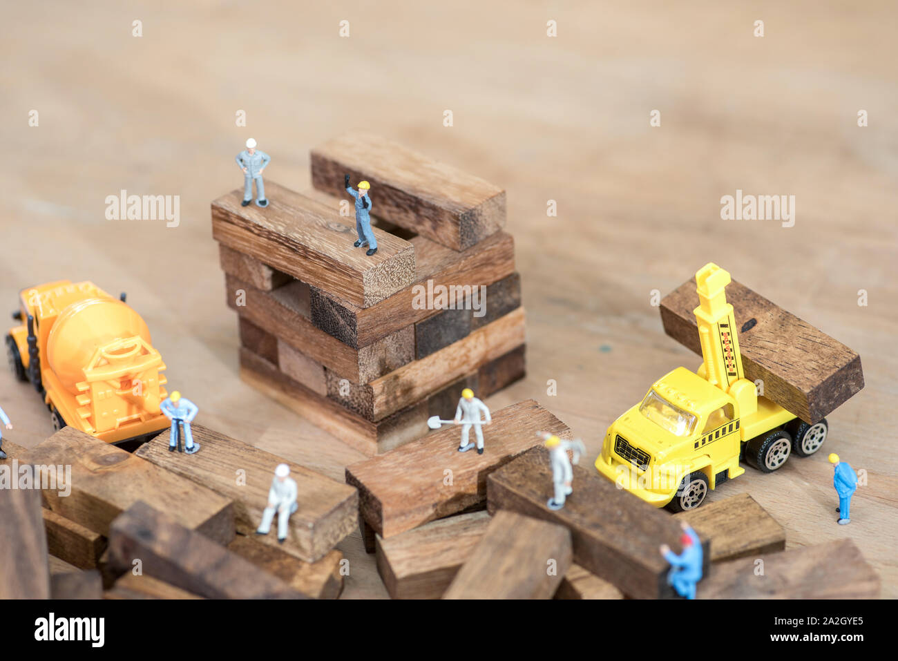 Industrial and construction concepts with miniature workers Stock Photo ...