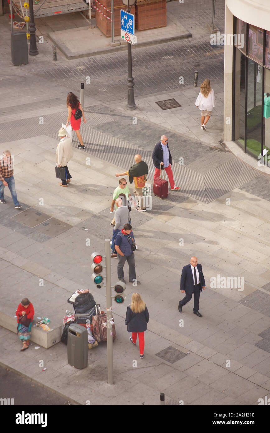 People walking on a pavement Stock Photo - Alamy