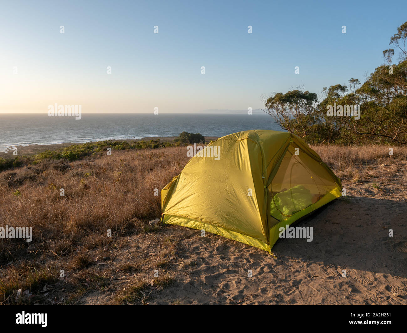 Tent campsite on bluff over ocean at sunset in Montana de Oro State ...
