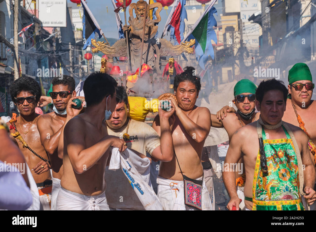 Palanquin bearers in procession during the Vegetarian Festival (Nine ...