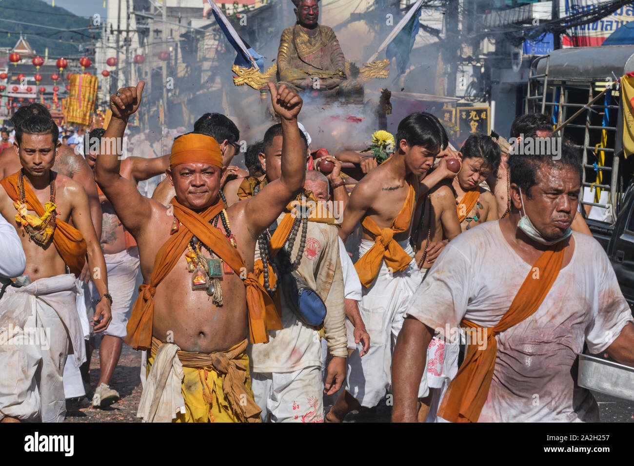 Palanquin bearers in procession during the Vegetarian Festival (Nine ...