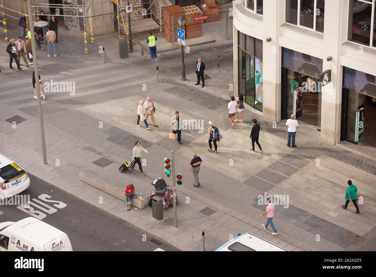 People walking on a pavement Stock Photo - Alamy
