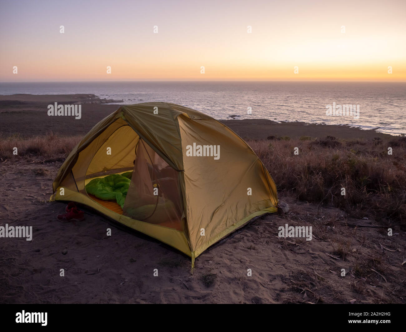 Tent campsite on bluff over ocean at sunset in Montana de Oro State ...
