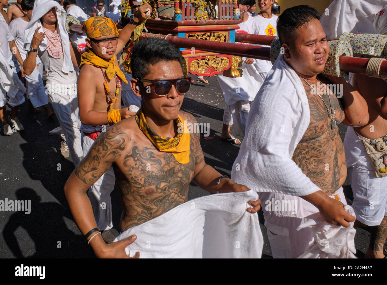 Palanquin bearers in procession during the Vegetarian Festival (Nine ...