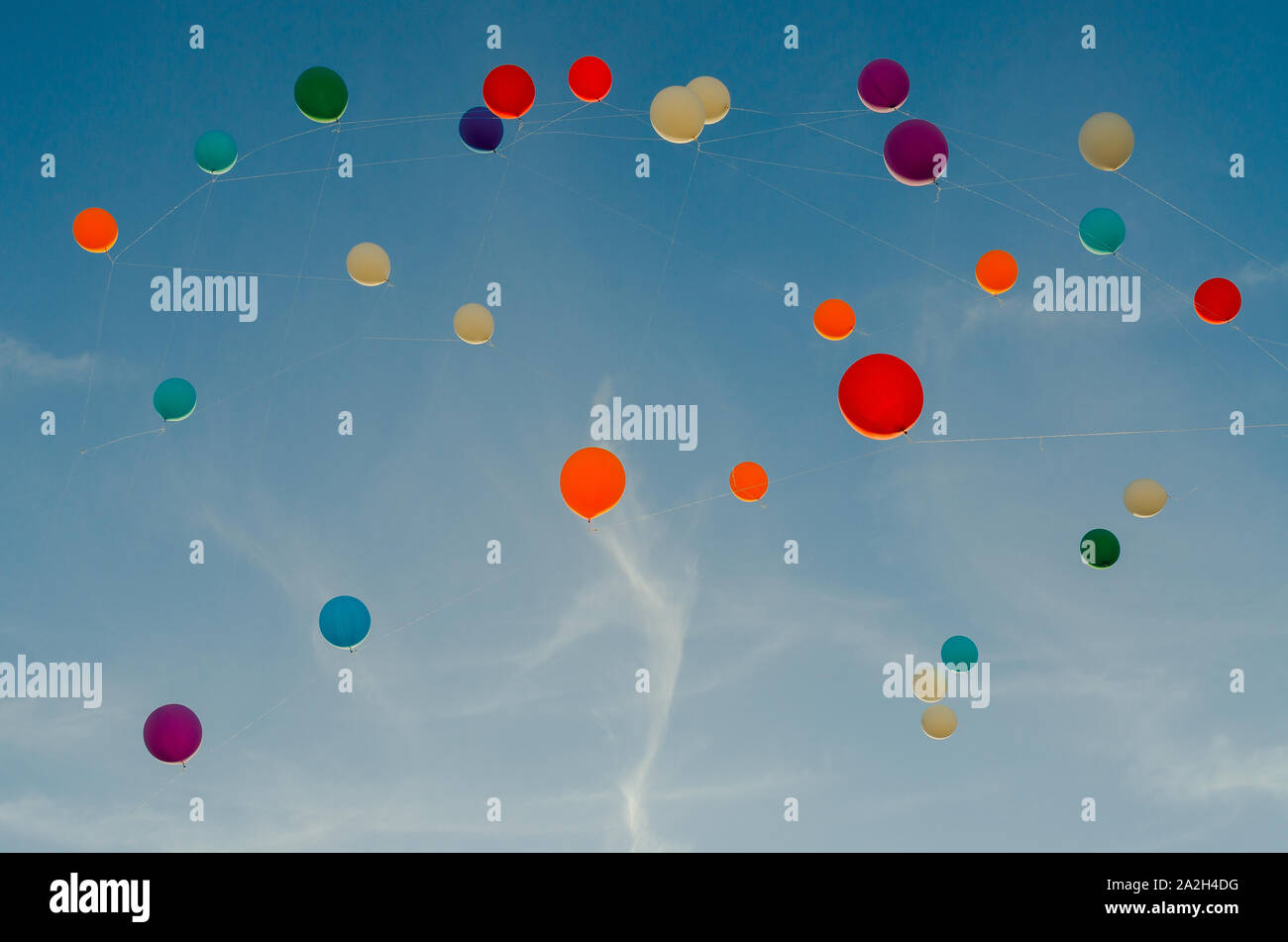 A lot of multi-colored balloons in the sky Stock Photo - Alamy