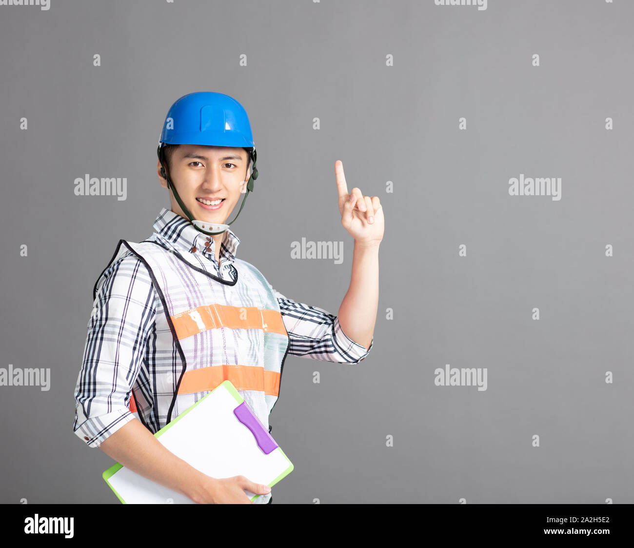 Construction worker pointing up hi-res stock photography and images - Alamy