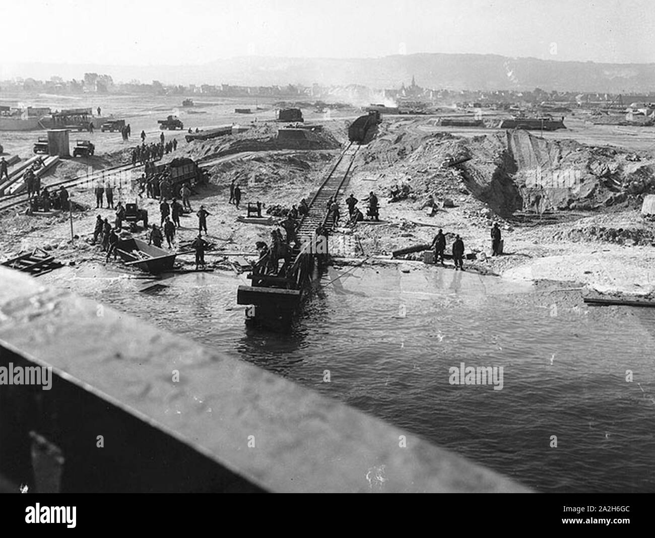 Engineers construct rail line on Normandy beach in June 1944 Stock ...