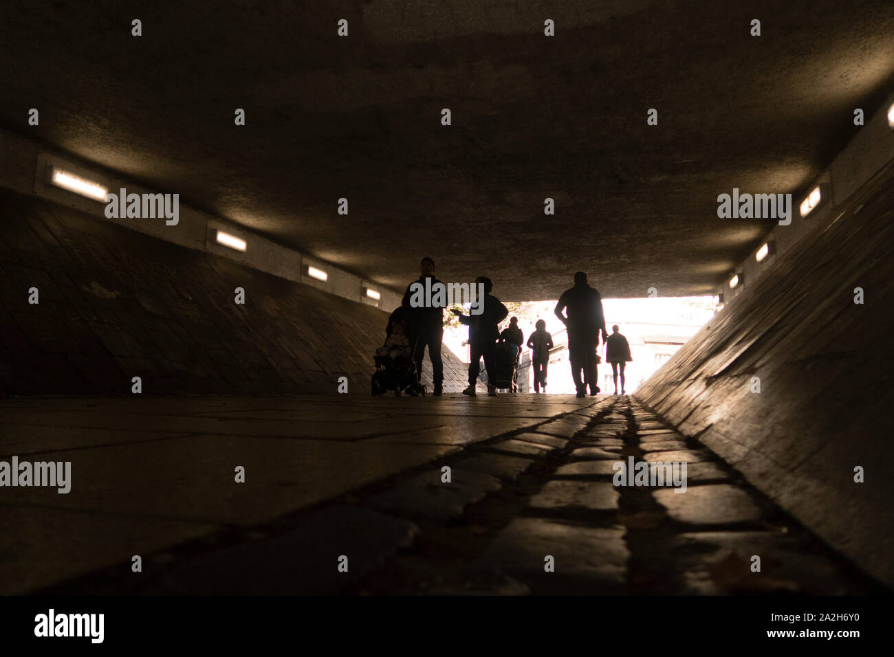 People walk in an underpass in Edinburgh city centre Stock Photo - Alamy
