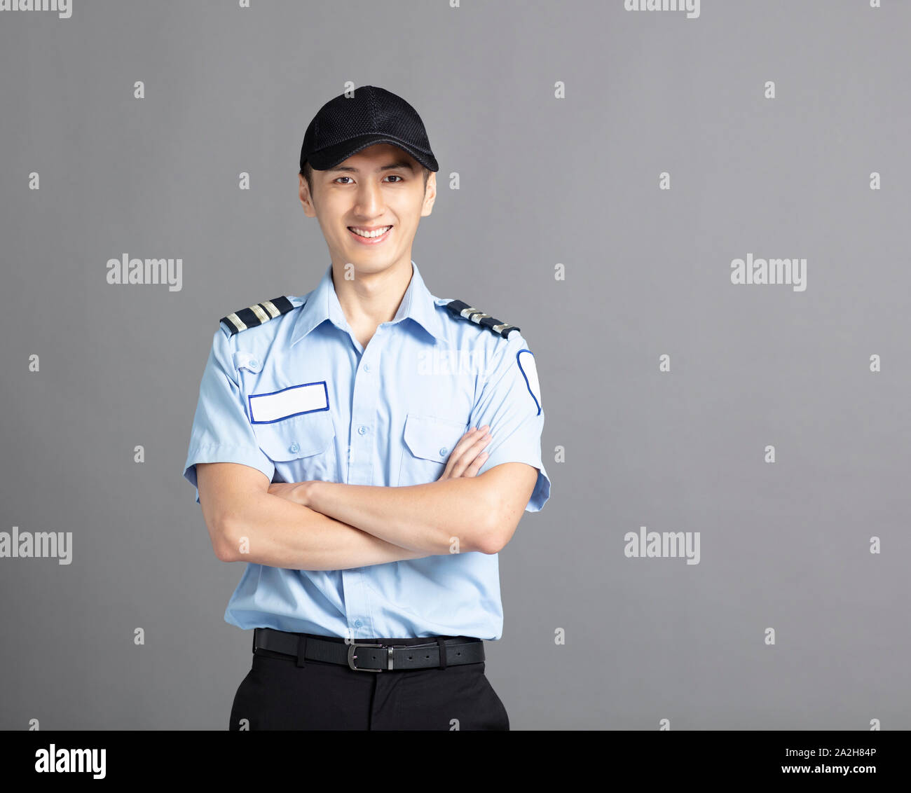 Portrait Of Asian Male Security Guard Stock Photo - Alamy