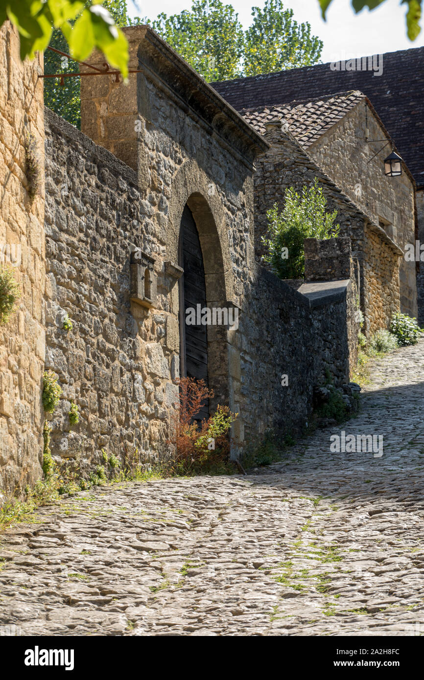 Typical French townscape with ancient housest and cobblestone street in ...