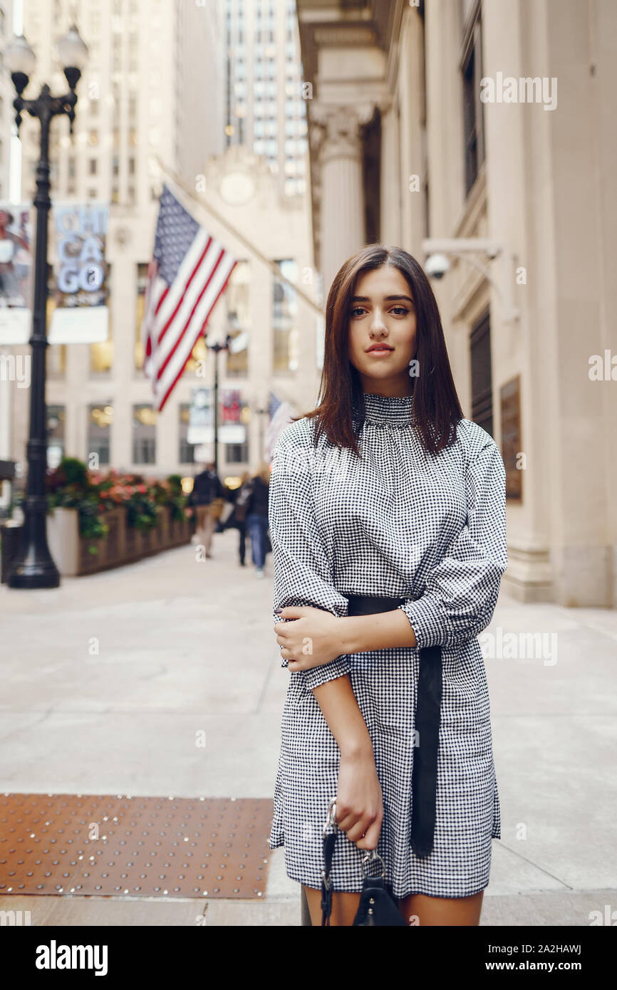 beautiful brunette girl exploring the city of Chicago Stock Photo - Alamy