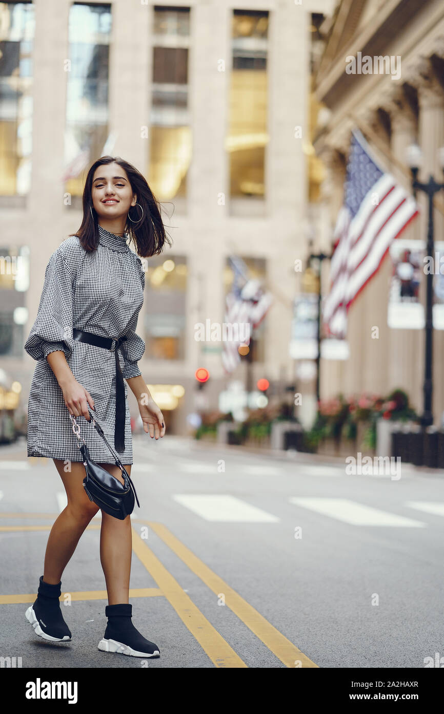 beautiful brunette girl exploring the city of Chicago Stock Photo - Alamy