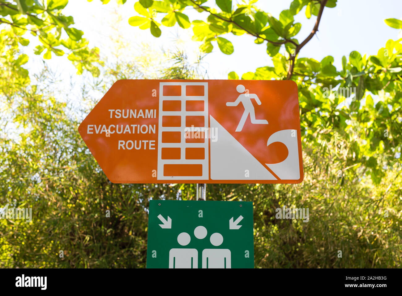 Tsunami roadsign pointing towards the stunami evacuation route, escape ...