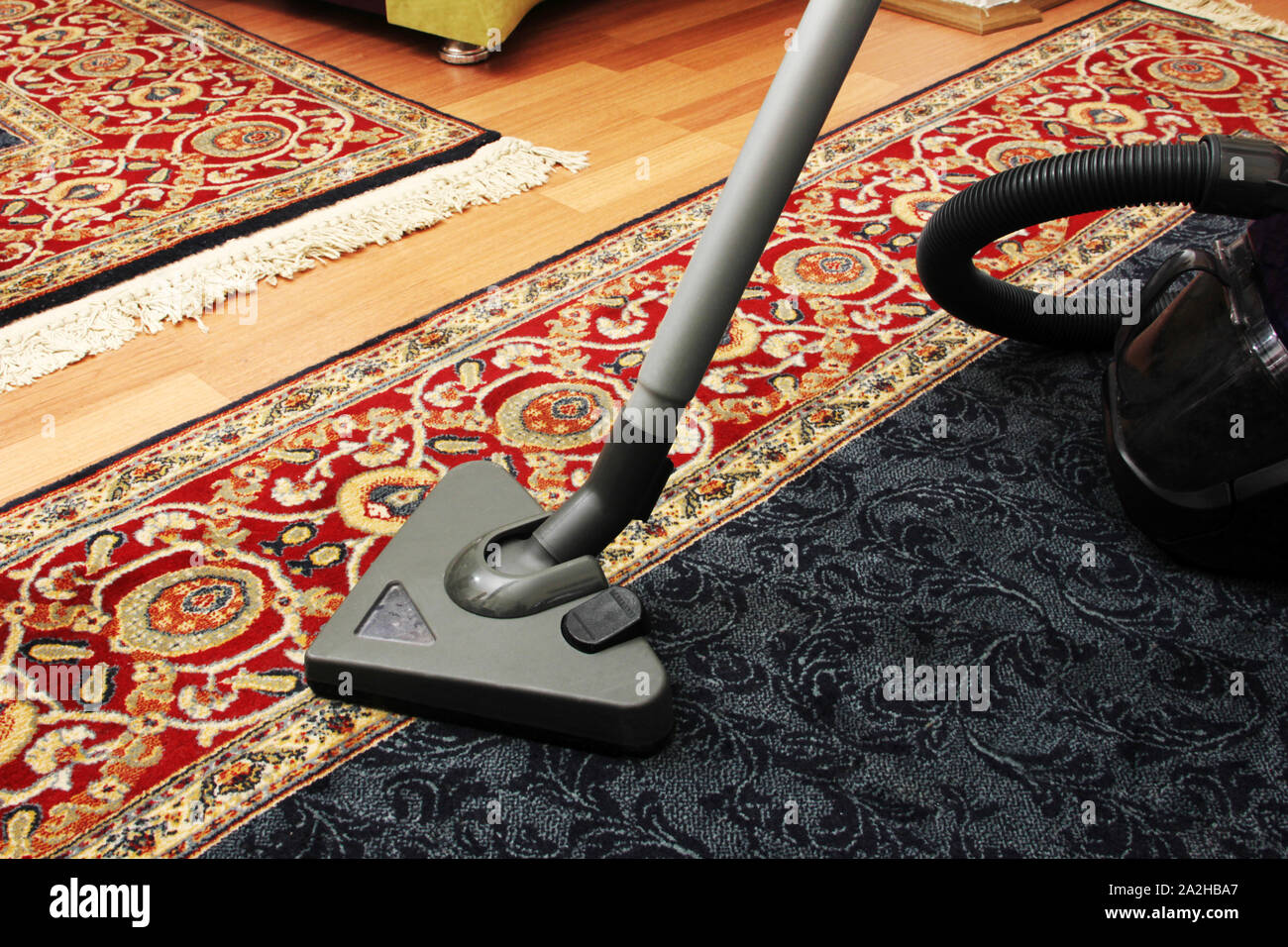 House cleaning with vacuum cleaner Stock Photo - Alamy